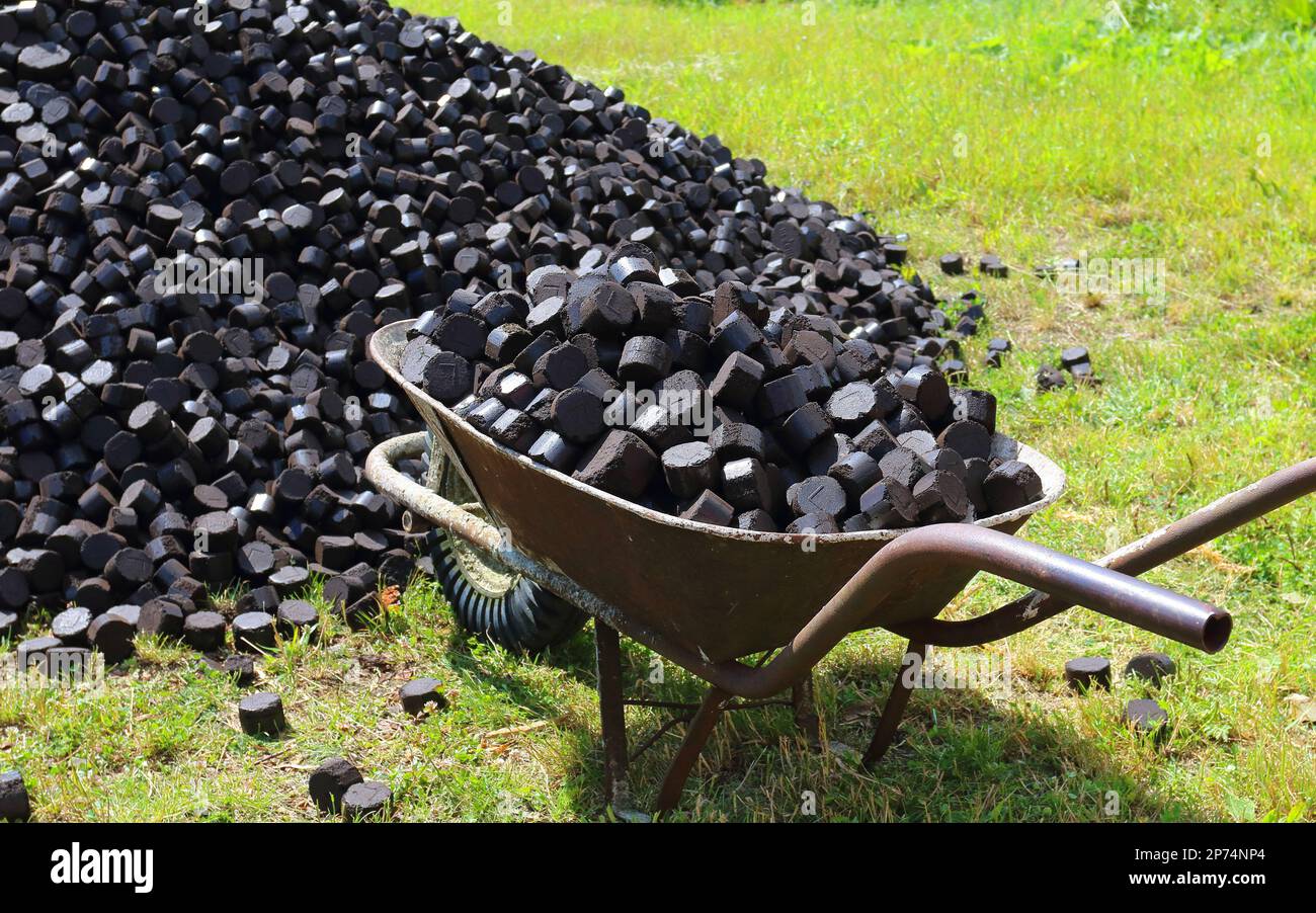 Old wheelbarrow used bringing coal Stock Photo - Alamy