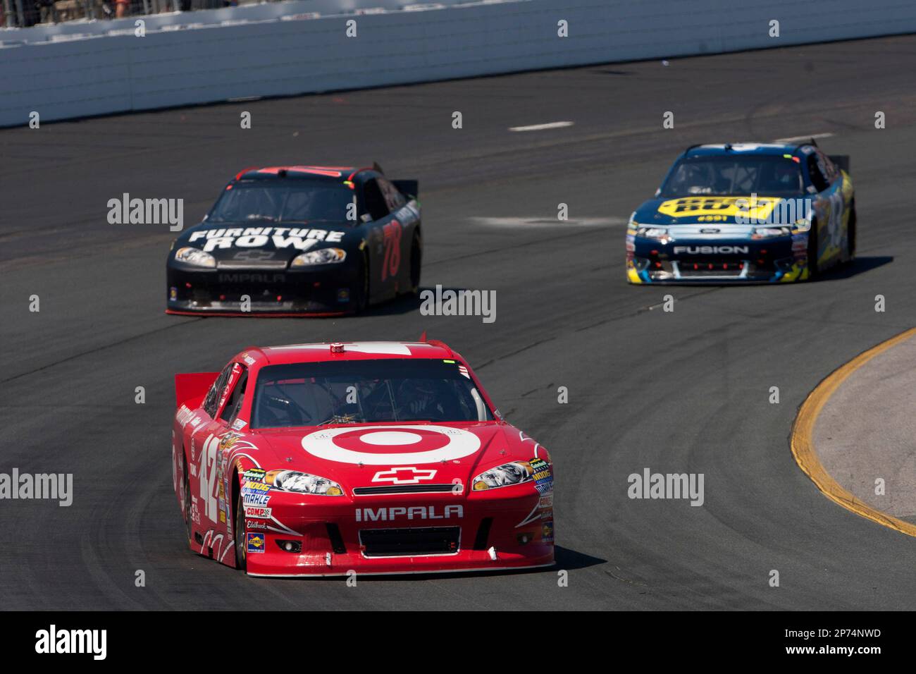 Loudon, NH - JUL 17, 2011: Juan Pablo Montoya (42) races to turn one ...