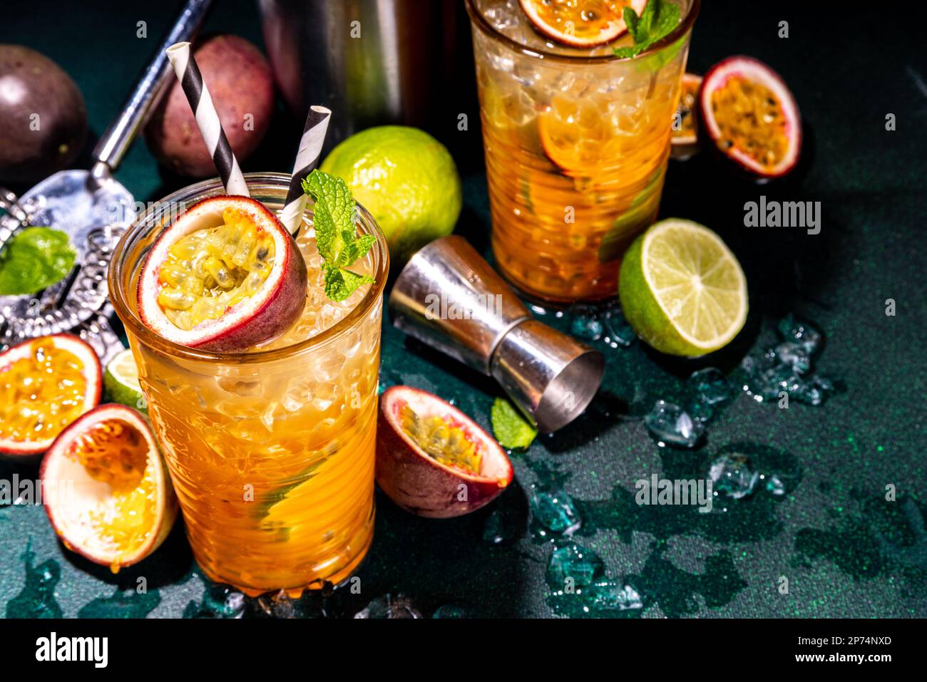 Sweet colorful tropical cocktail with passion fruit, lime and mint ...