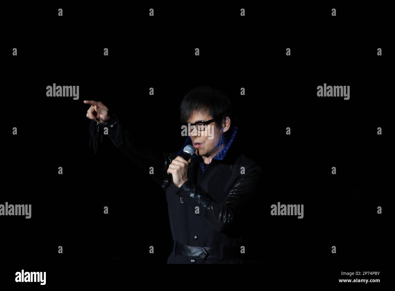 Taiwan singer Lo Ta-yu performs during his concert in Chengdu in ...