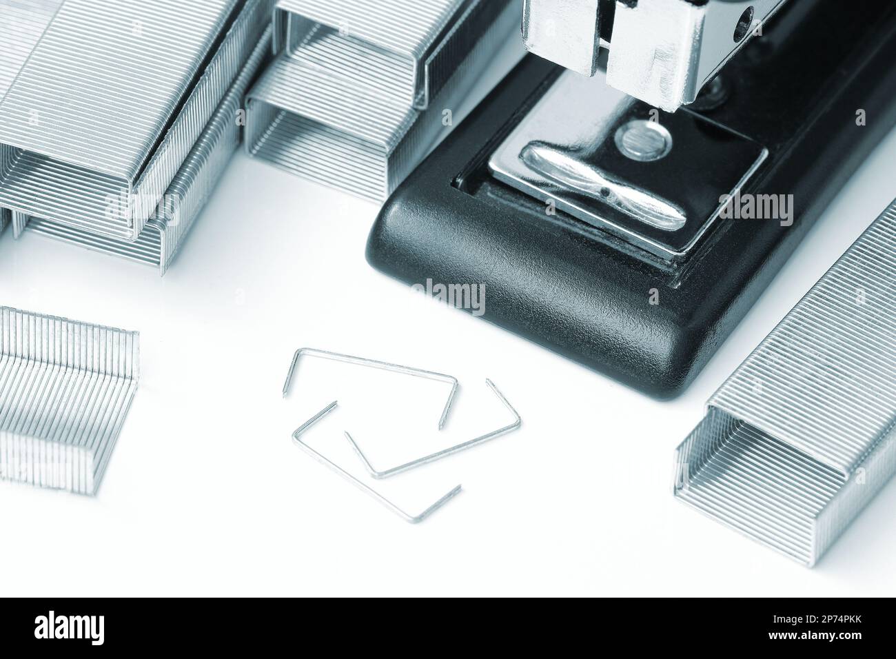 Stapler with staples wires on white background Stock Photo - Alamy