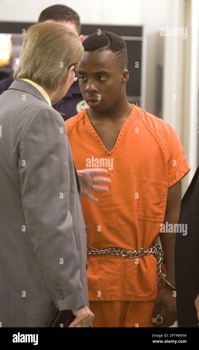 Devante Barnett, 19, talks with his attorney Dane Perry, Monday July 11 ...