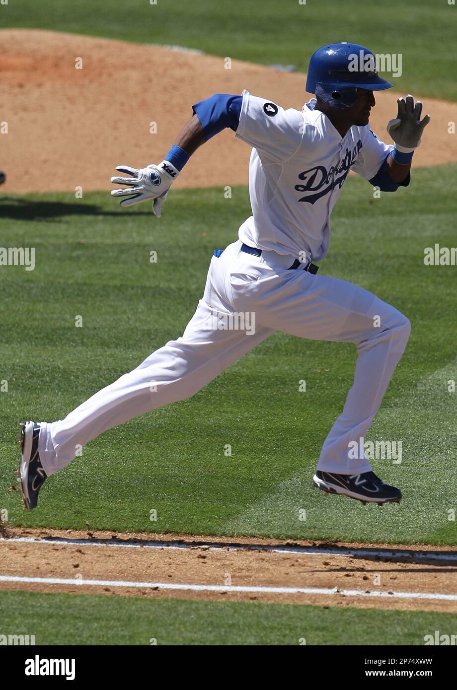 Los Angeles Dodgers outfielder Eugenio Velez runs to first base during ...