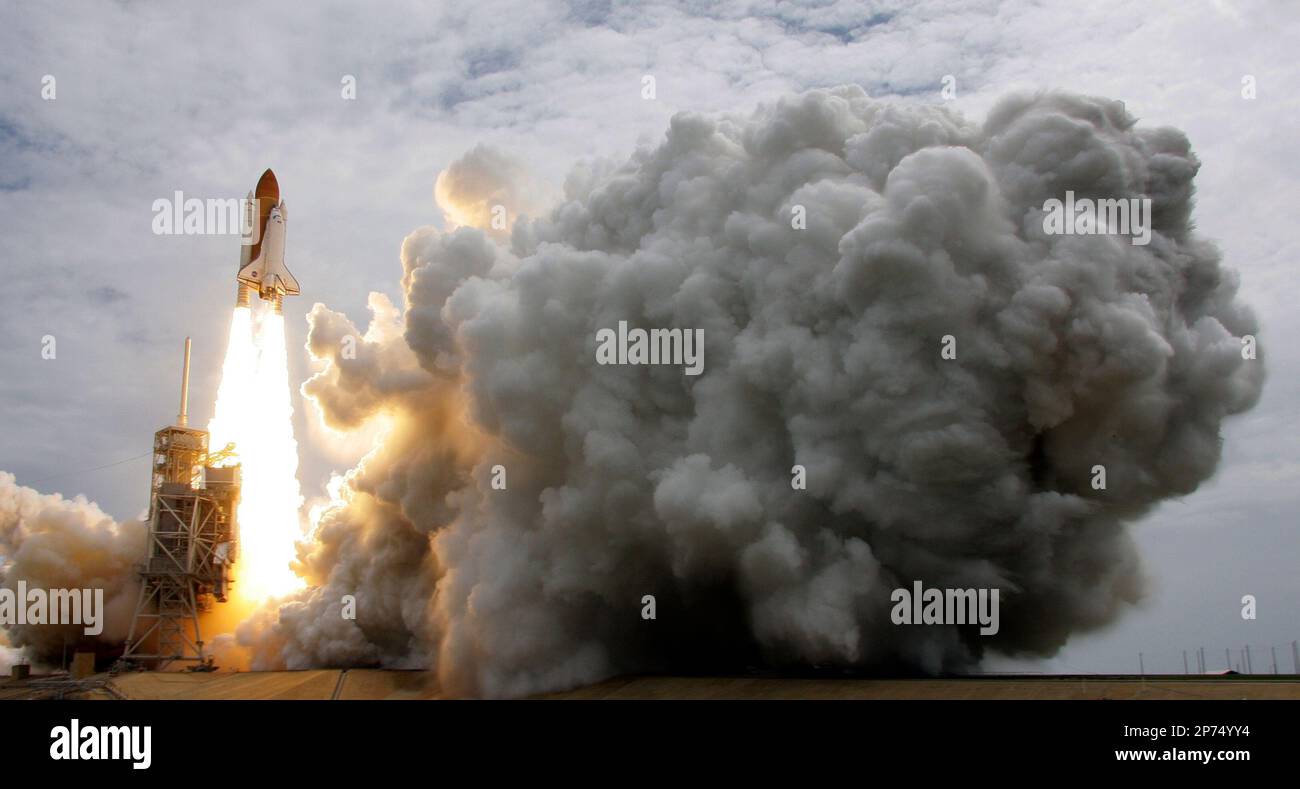 The space shuttle Atlantis lifts off from the Kennedy Space Center ...