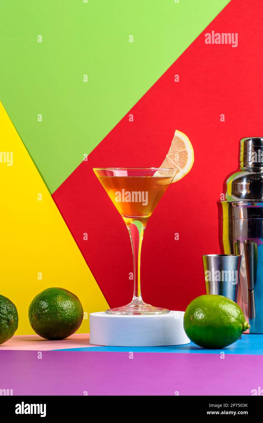 Yellow bird cocktail with white rum, liquor and lime juice in martini ...