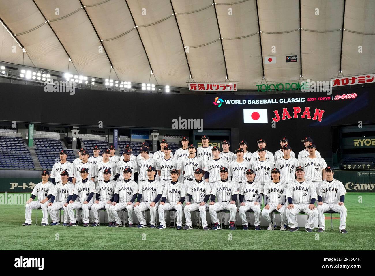Japan's team pose for a group photo session before an official training ...