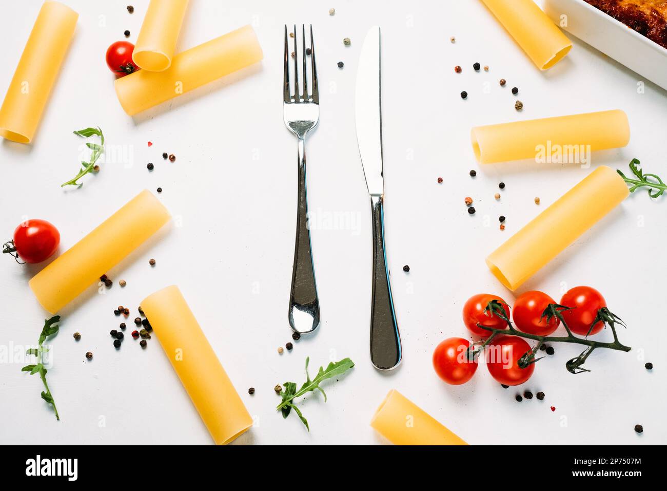 kitchen creative cutlery white background Stock Photo - Alamy