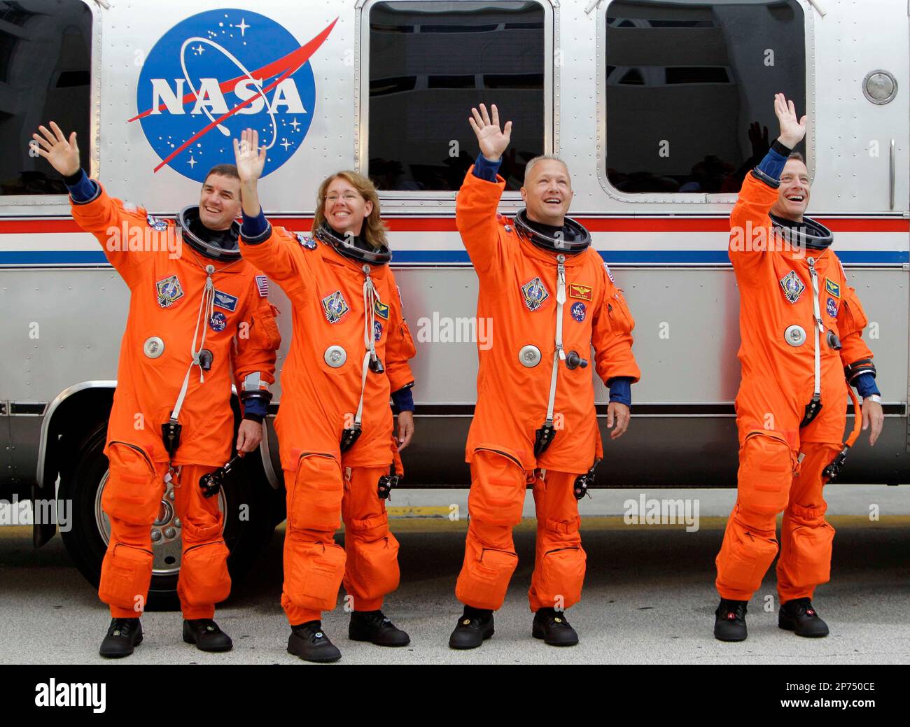 The space shuttle Atlantis astronauts left to right, mission ...