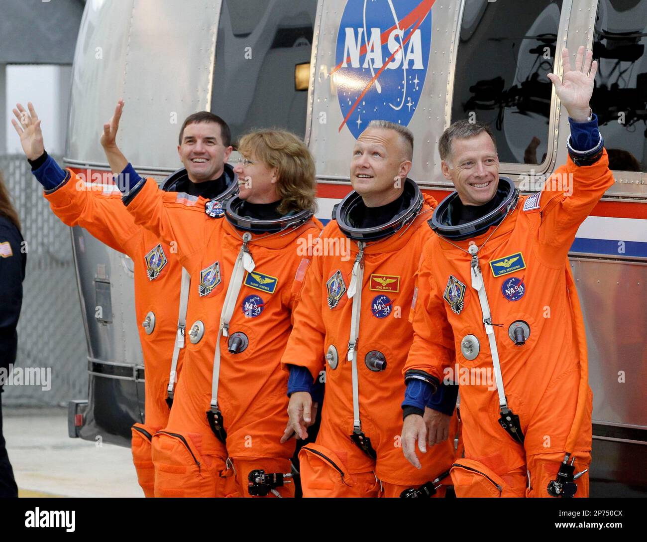 The space shuttle Atlantis astronauts left to right, mission ...