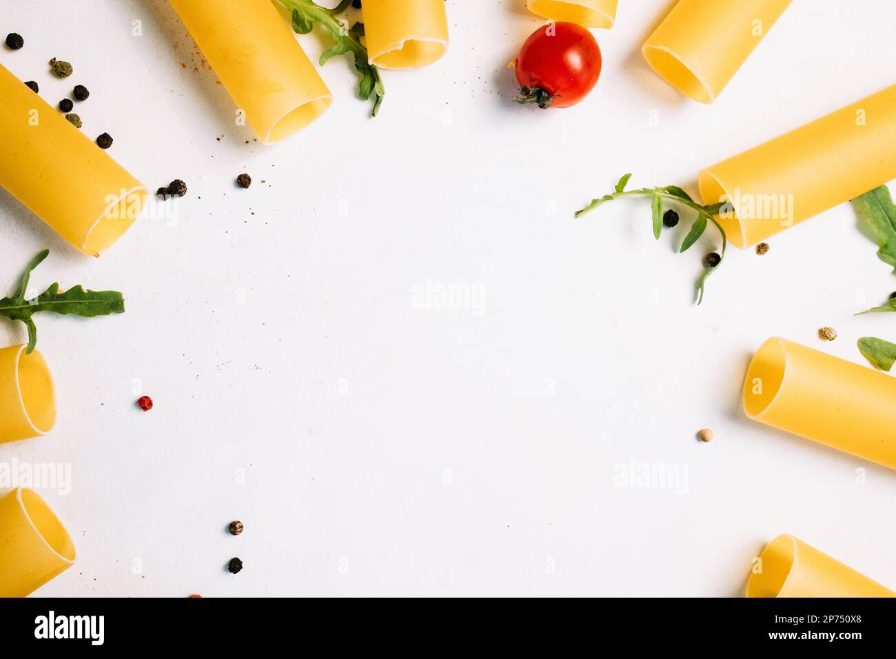 negative space macaroni food white background Stock Photo - Alamy
