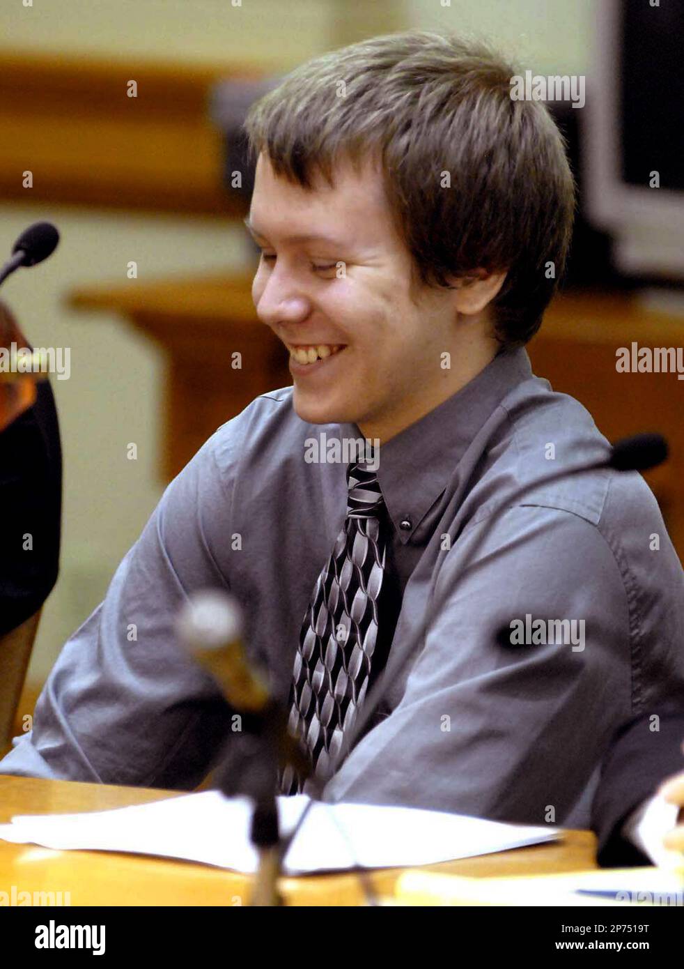 Michael Swanson smiles as District Court Judge Thomas Bice describes ...