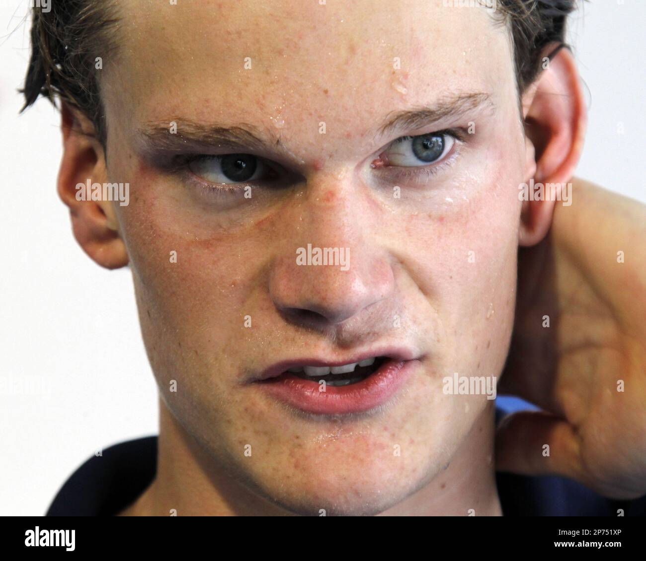 Yannick Agnel, of France, gets interviewed after winning the mens 400 ...
