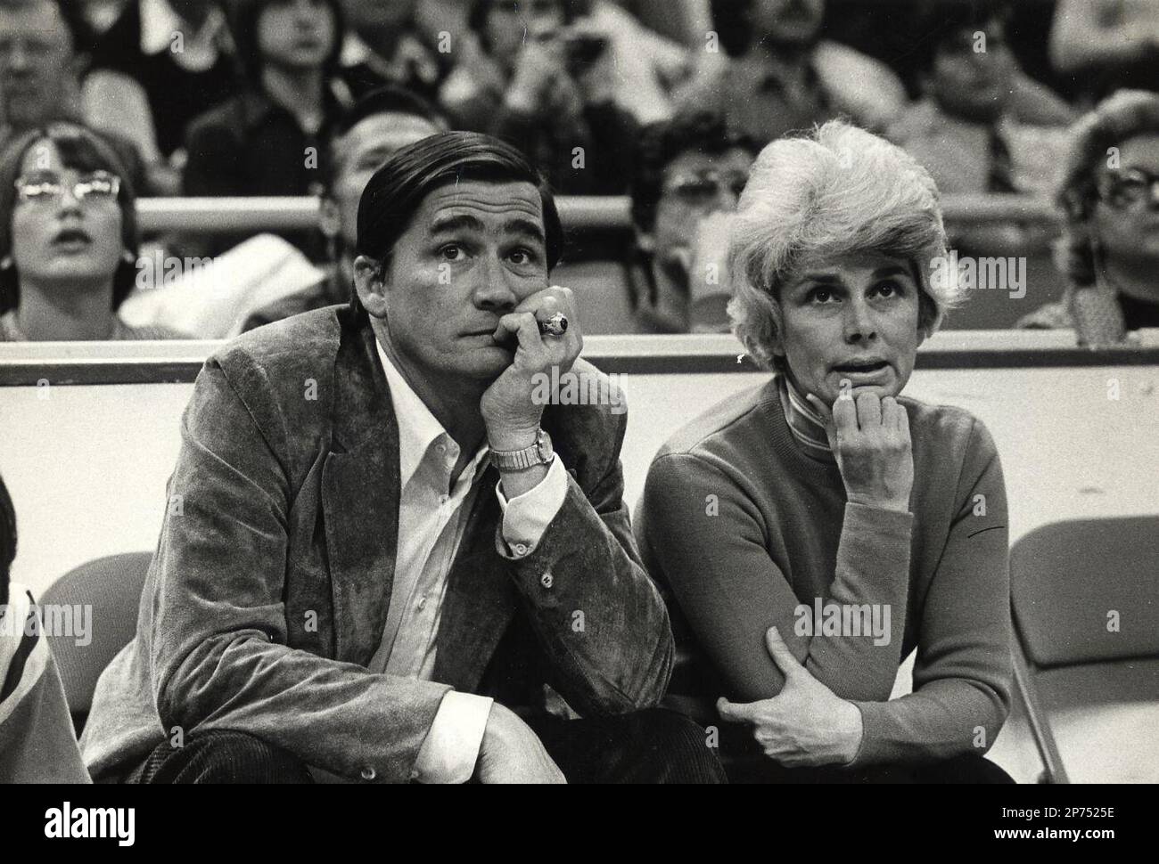 Tom Cousins and wife, Anne, at a Hawks game. Cousins cites his wife ...