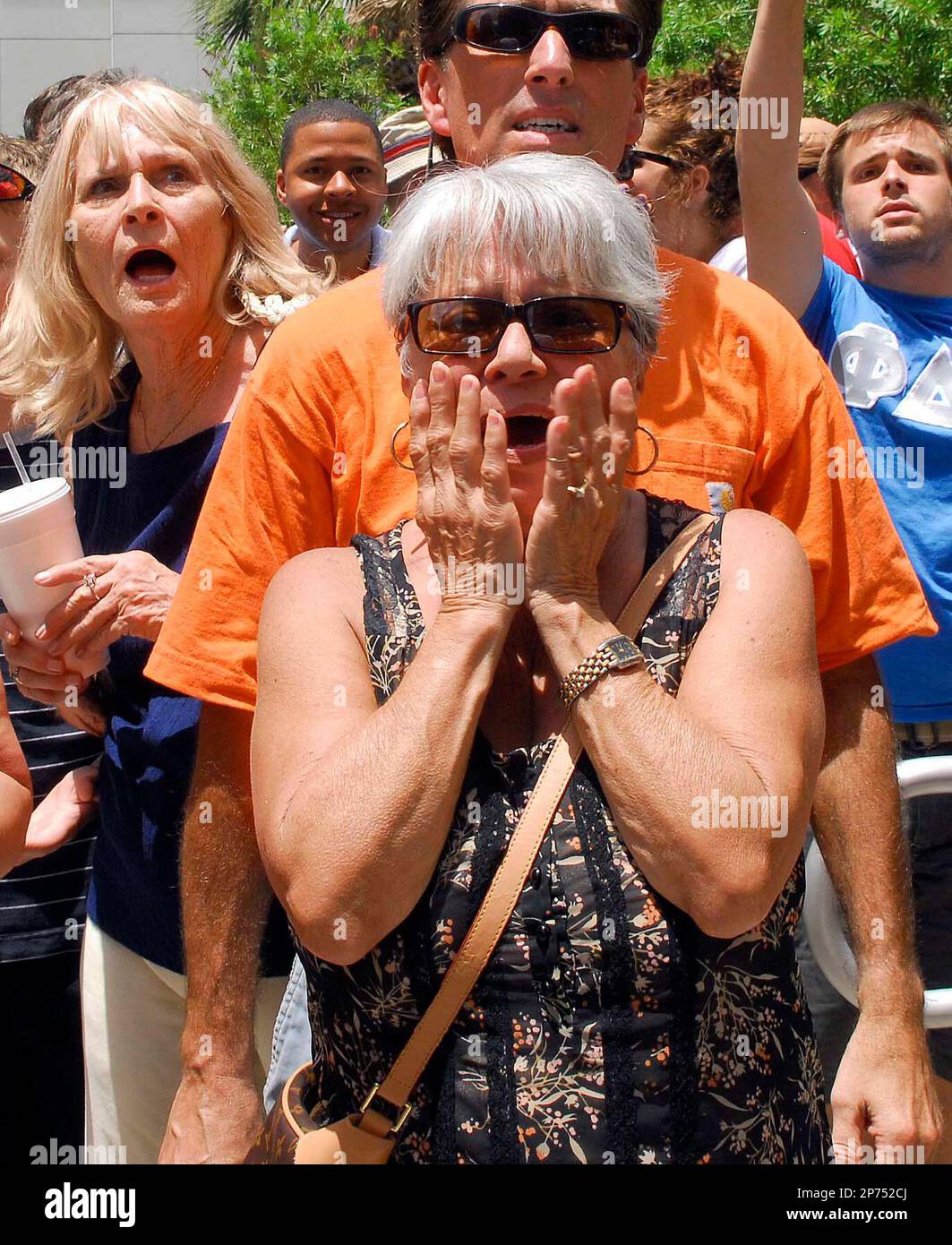 A crowd reacts outside of the Orange County Courthouse in Orlando, Fla ...