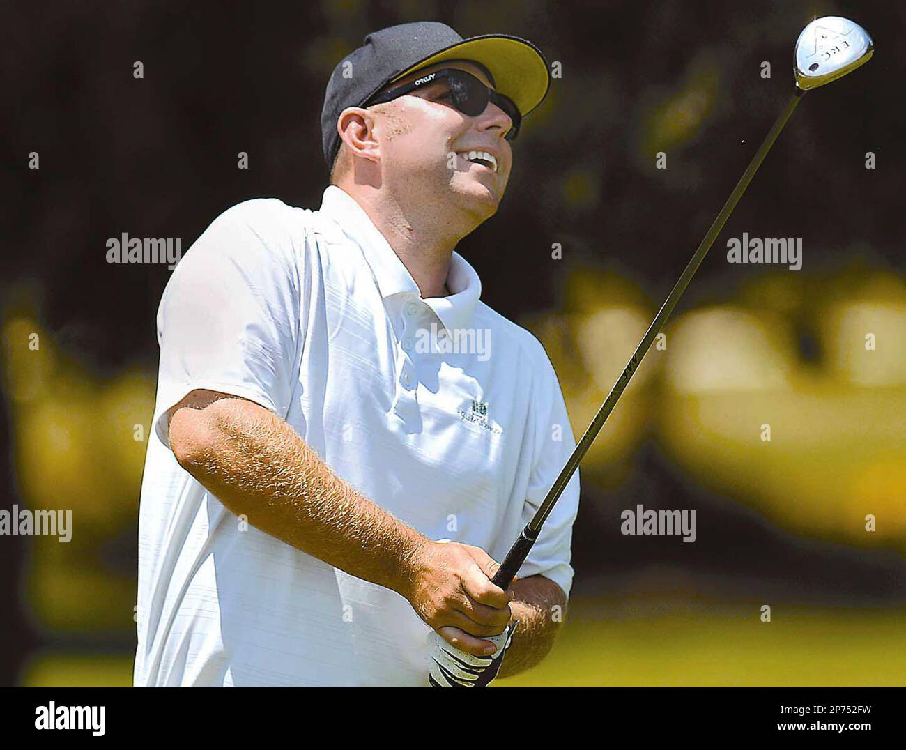 Adam Kaminski watches a tee shot on the Meadows Course during the first ...