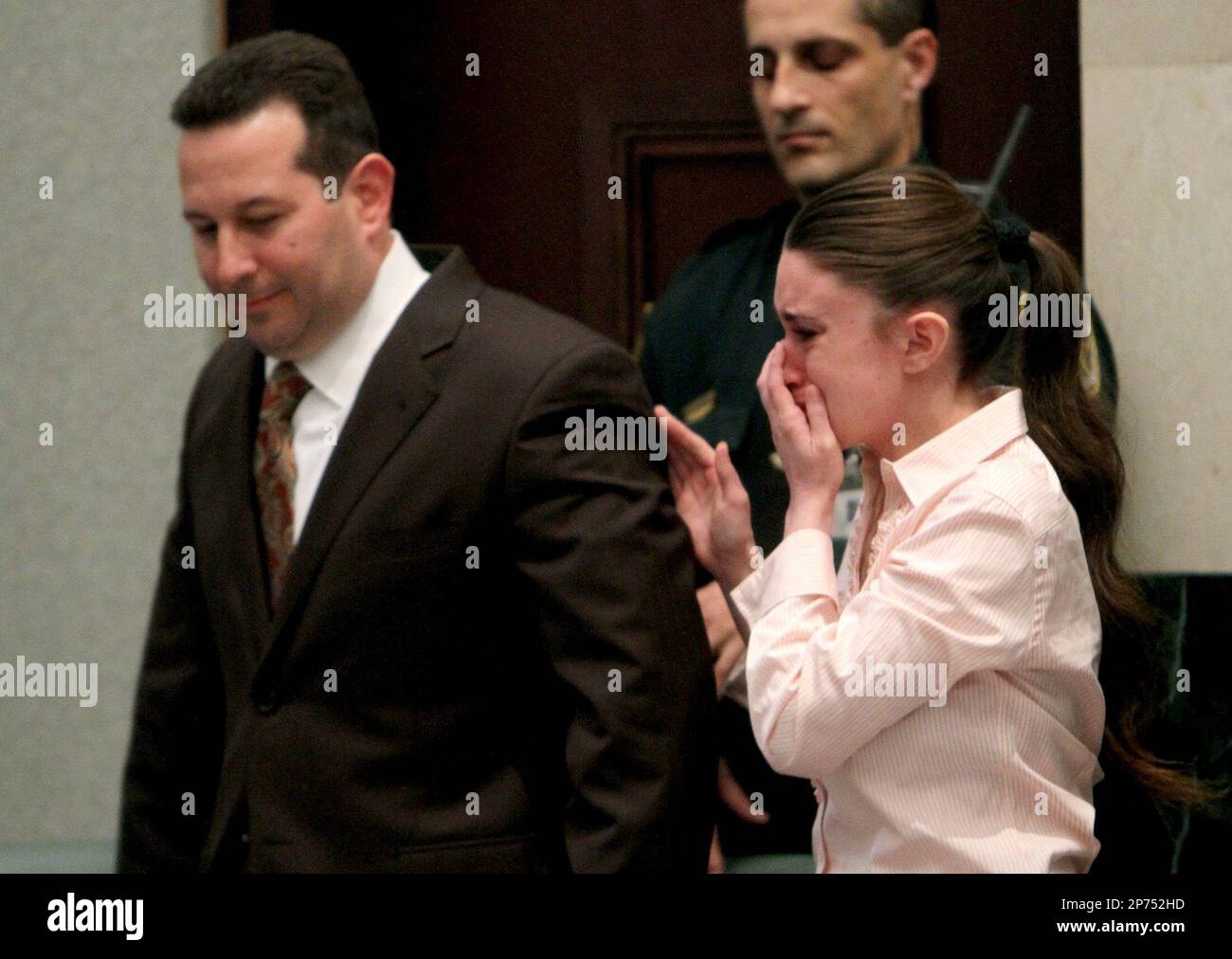 Defense attorney Jose Baez and Casey Anthony react after the jury ...