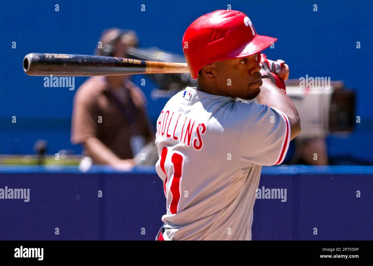 Philadelphia Phillies' Jimmy Rollins hits a two-RBI single during the ...