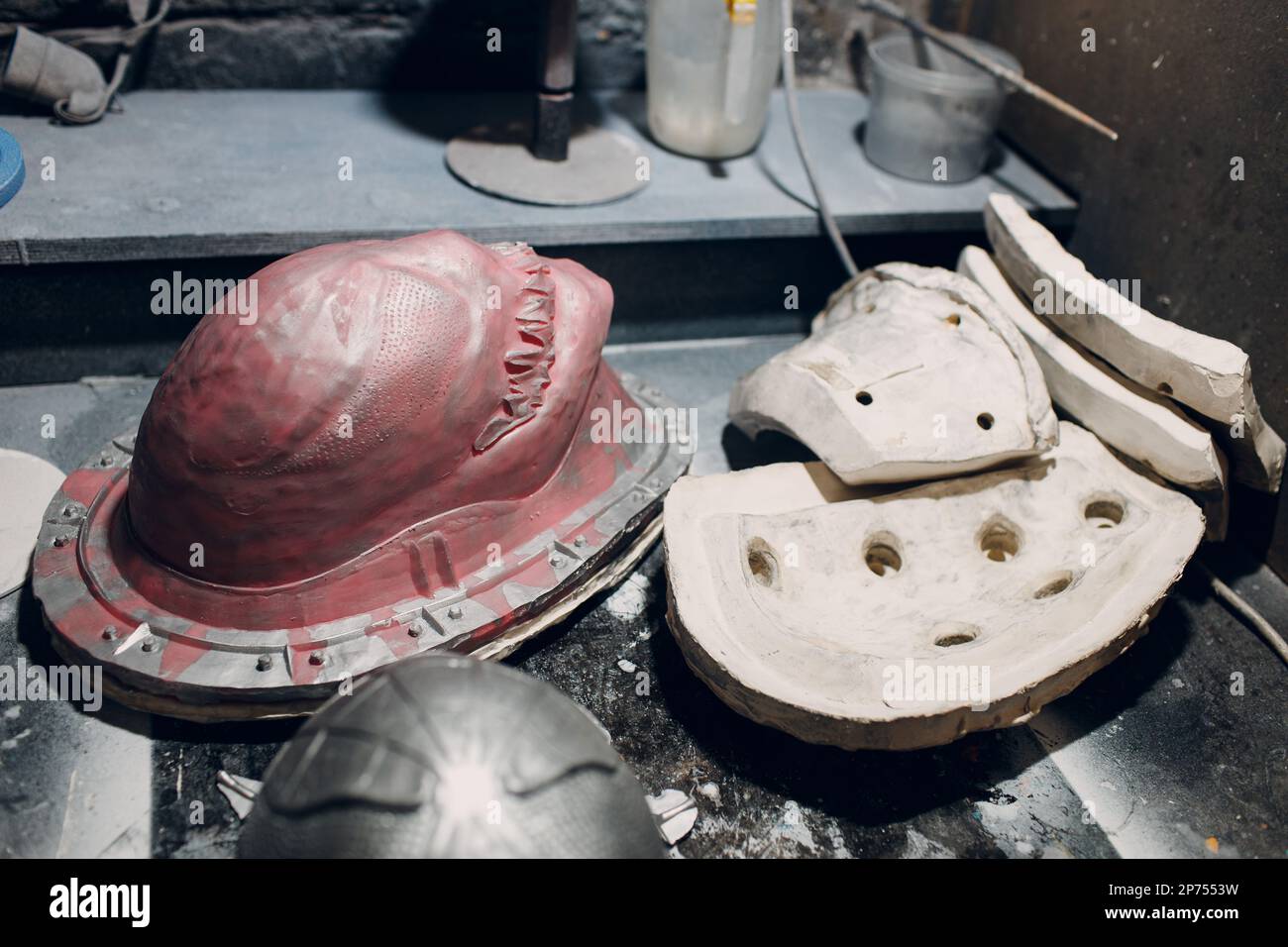 Artisan craftsman create mask based on plaster cast. Gypsum mold and ...