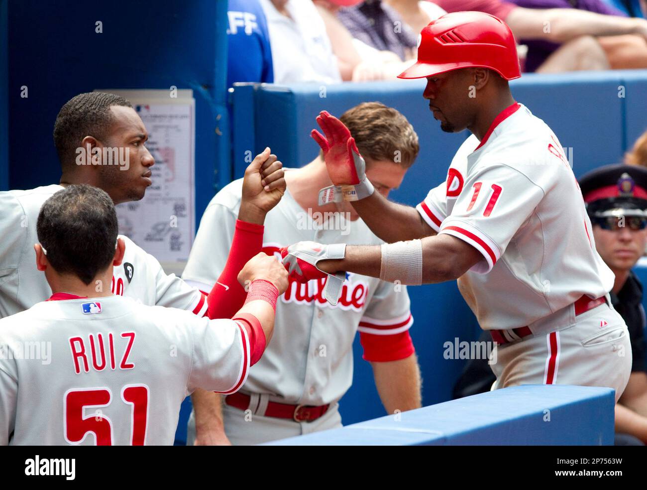 Philadelphia Phillies Jimmy Rollins, right, is congratulated by ...