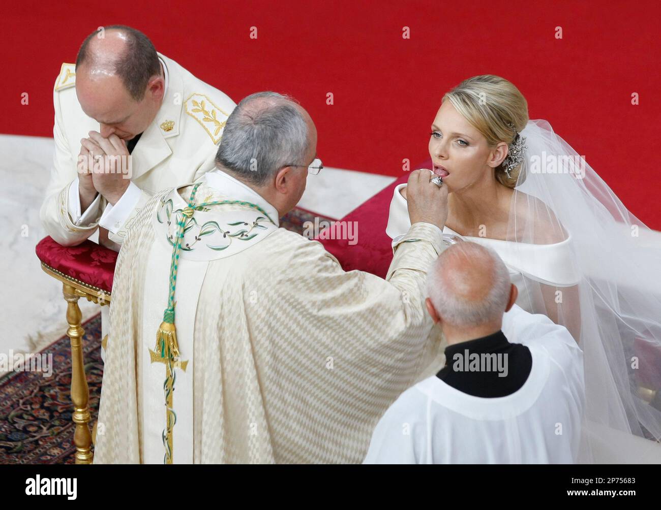 Prince Albert II of Monaco and Charlene Princess of Monaco take holy ...
