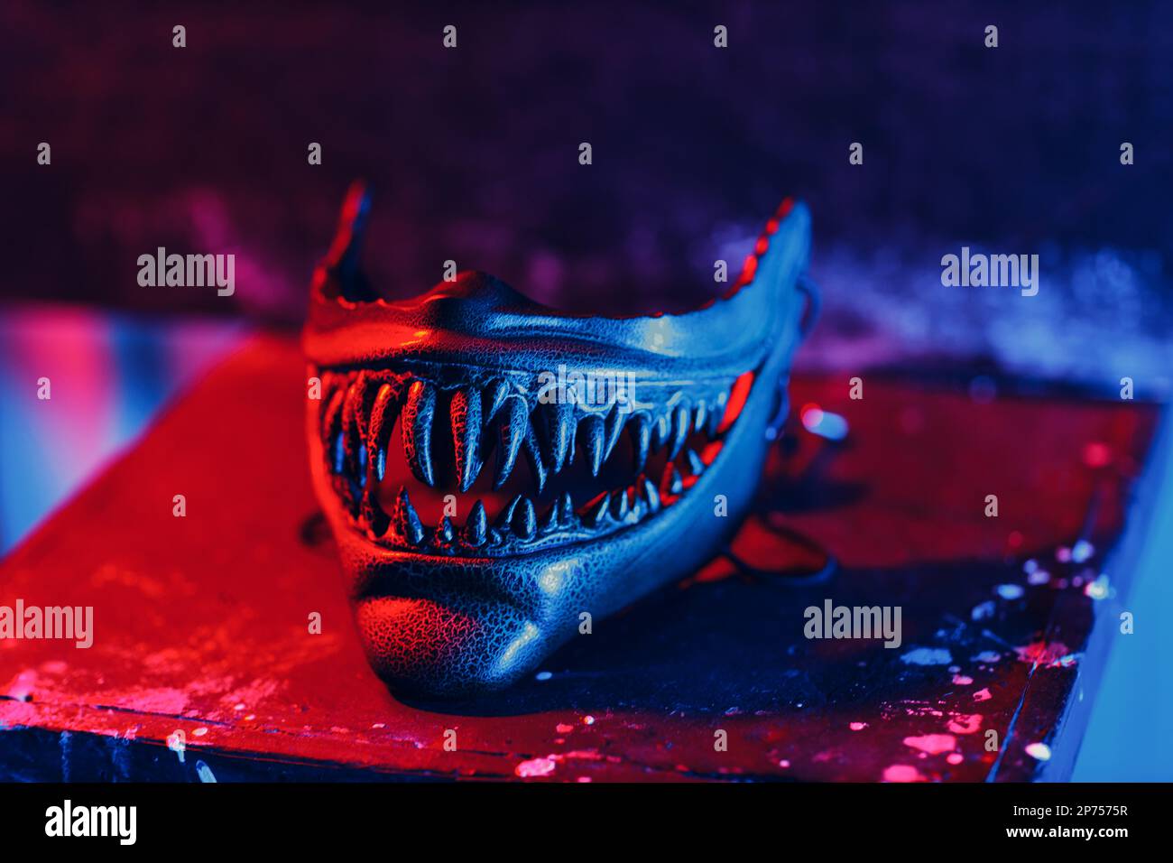 Scary plastic mask. Artisan craftsman create mask based on plaster cast ...