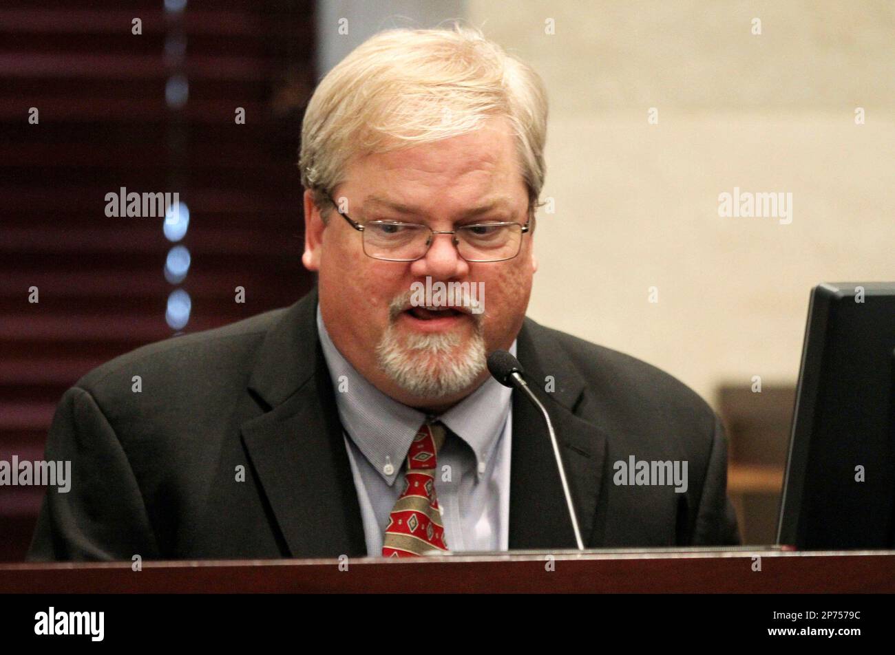 Anthropologist Michael Warren testifies during the trial at the Orange ...