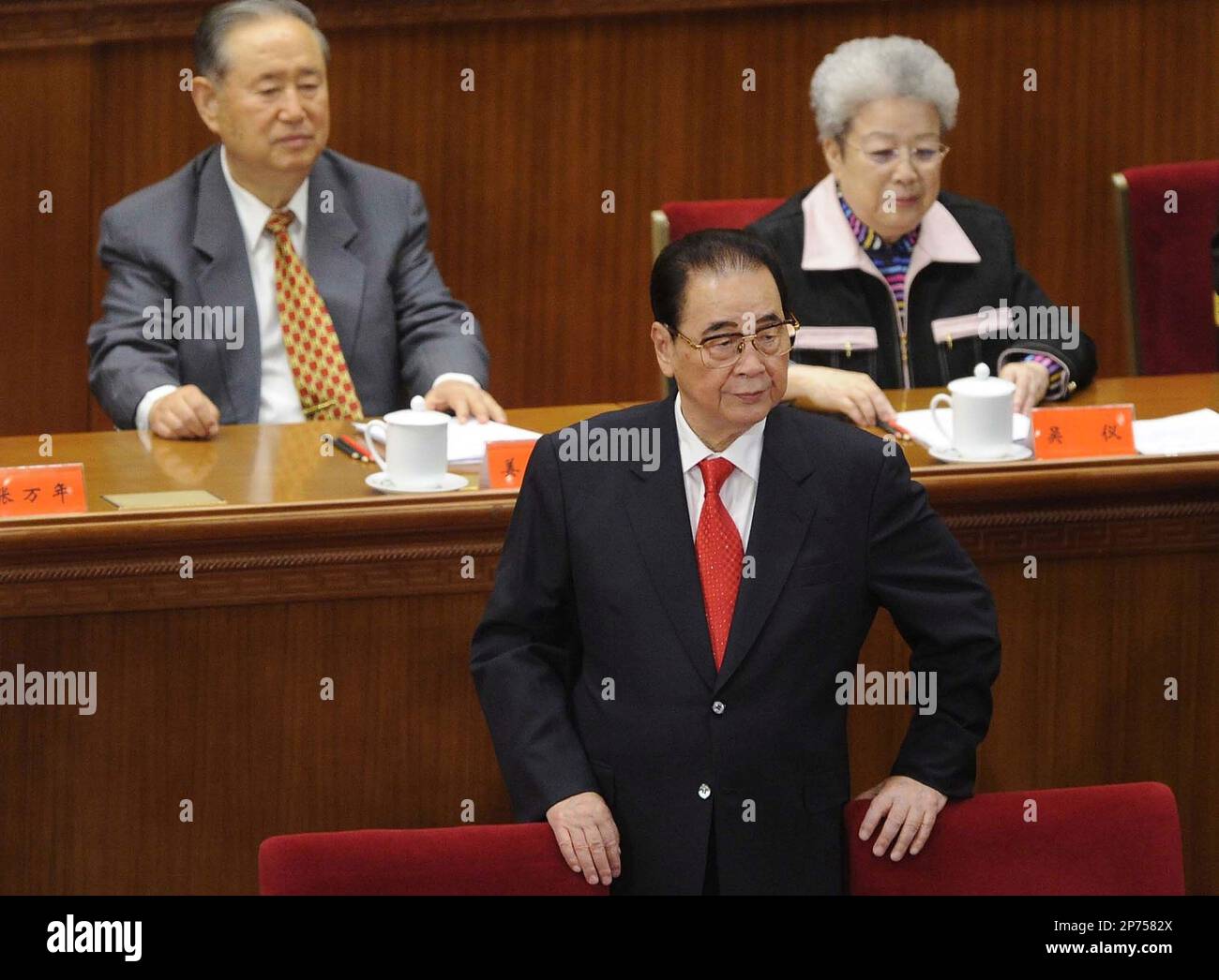 Former Chinese premier Li Peng attends a meeting celebrating the 90th ...