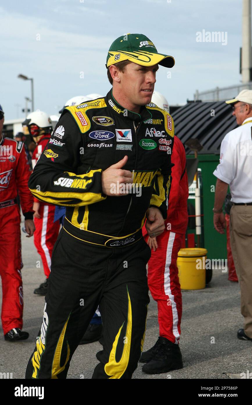NASCAR driver Carl Edwards sprints to his car prior to practice for the ...