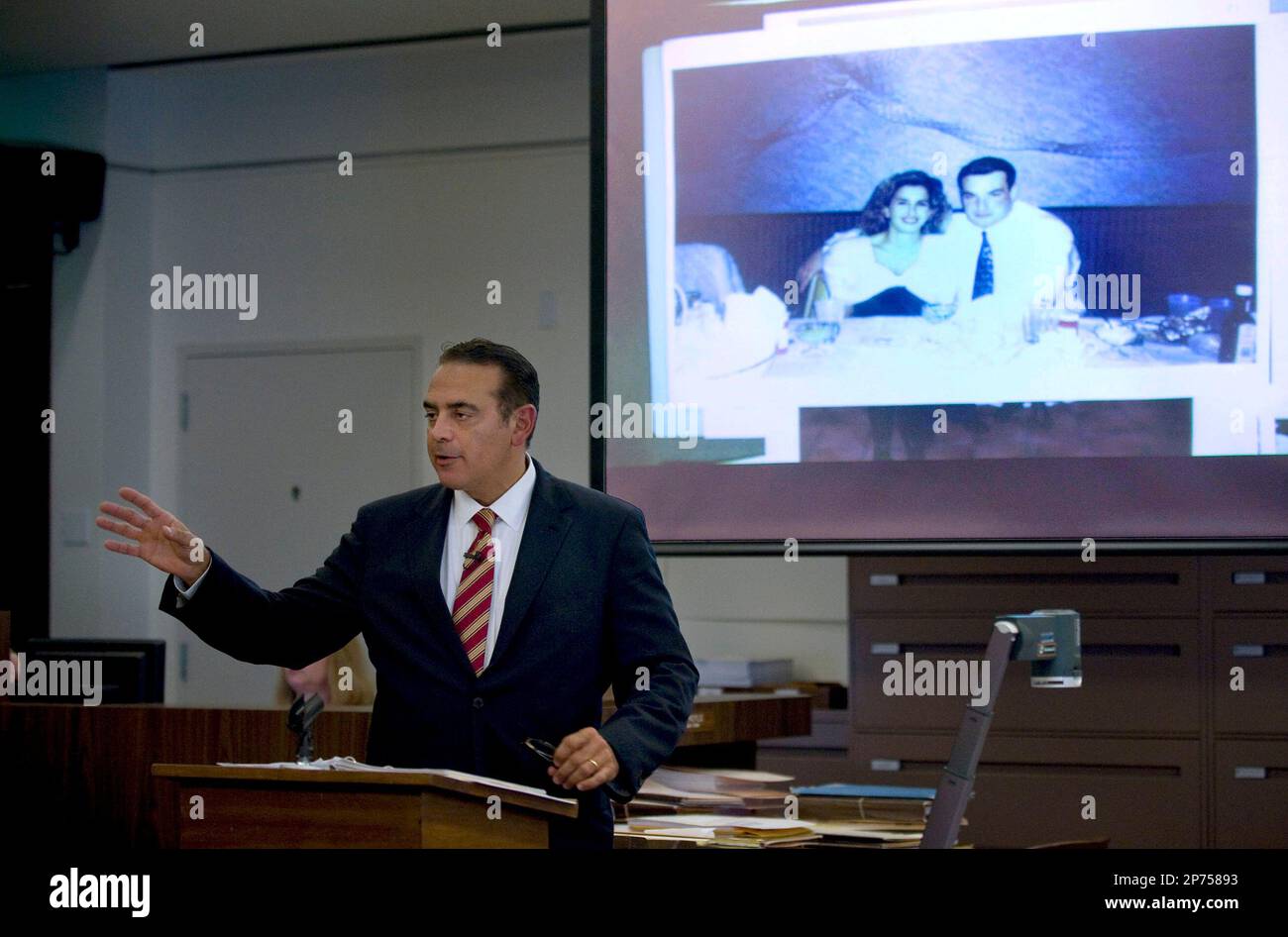 Defense attorney Angelo MacDonald delivers opening statements while he ...