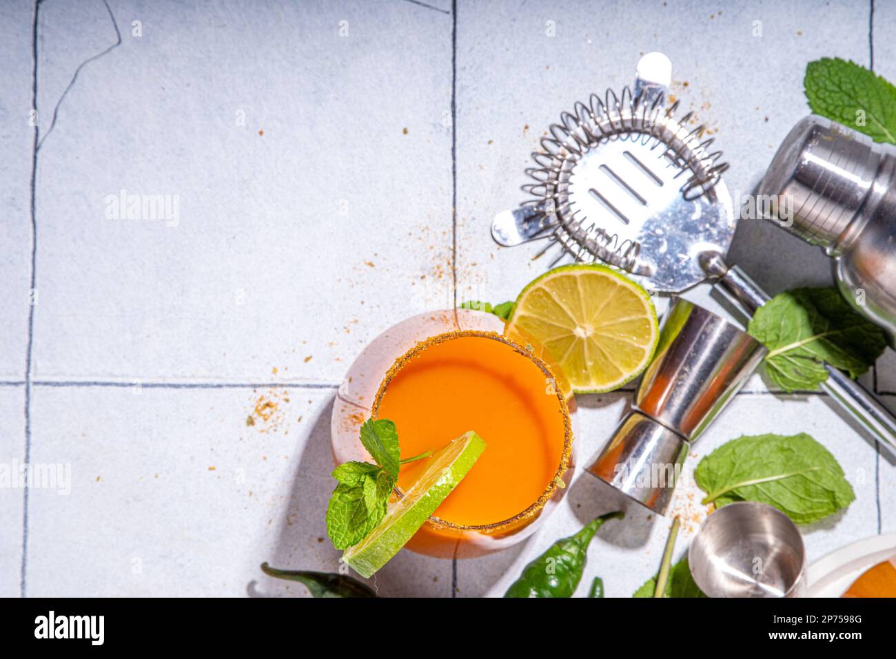 Carrot Ginger Margarita cocktail with lime, mint and hot chili pepper ...