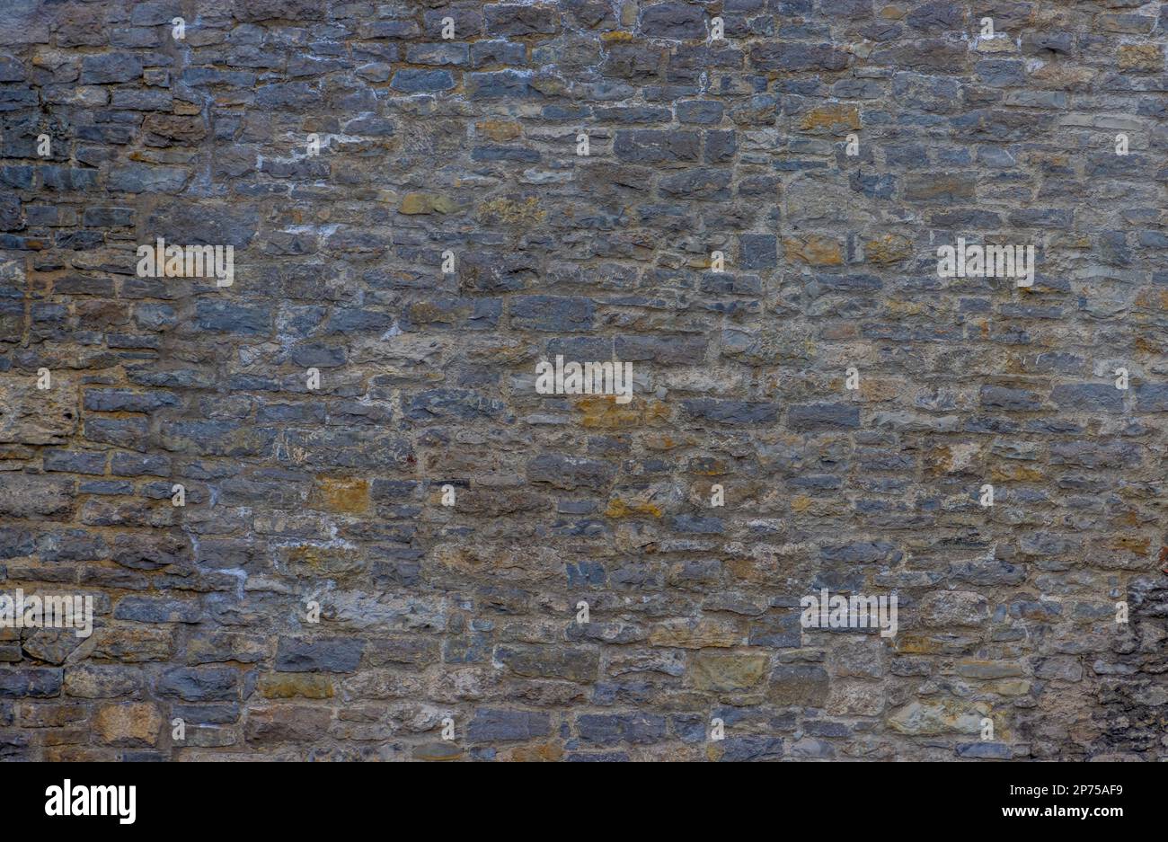 Natural stone wall background texture Stock Photo - Alamy