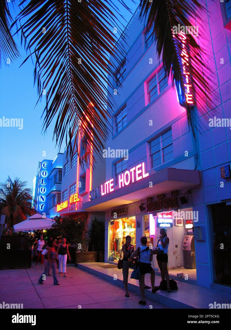 Miami Beach nightlife, neon lights, and pastel colors light up a hotel ...
