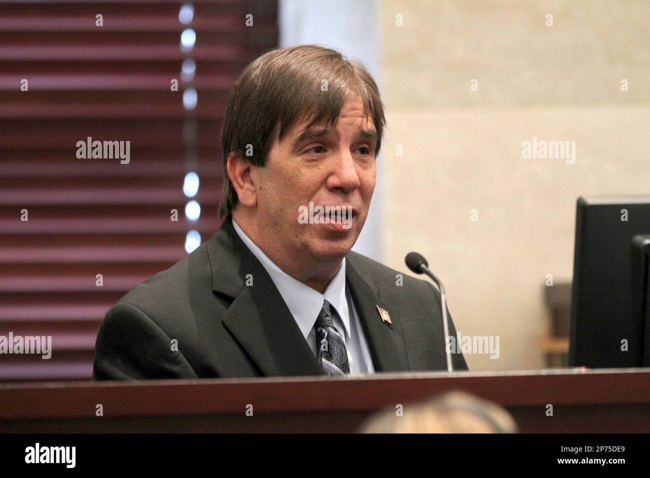 Roy Kronk, a meter reader for Orange County, testifies during the Casey ...