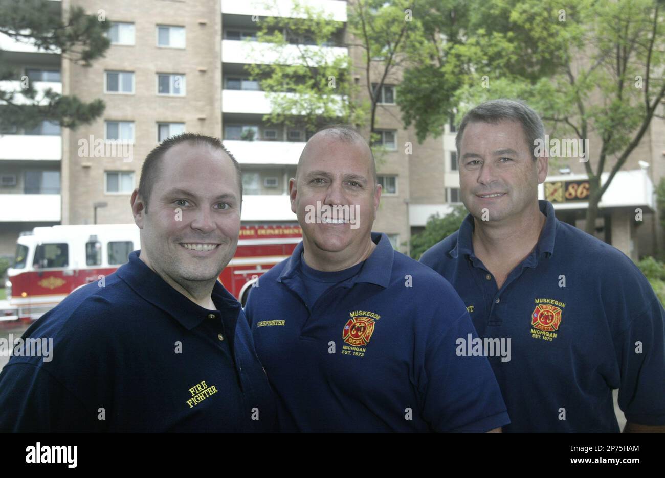 In this June 23, 2011 photo shows, from left, Muskegon Firefighter and ...