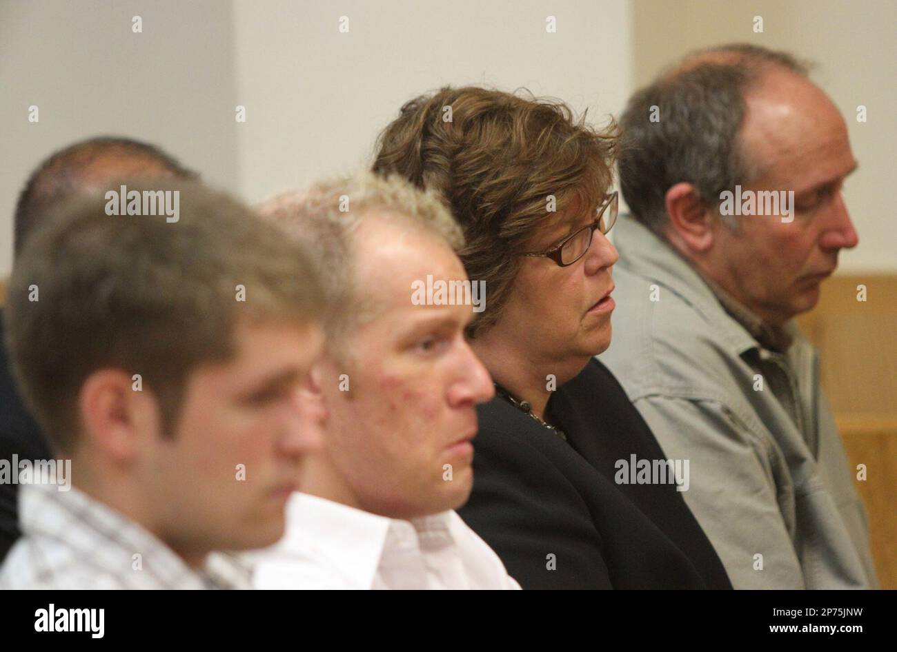 Members of Michael Swanson’s family sit during testimony, at right are ...