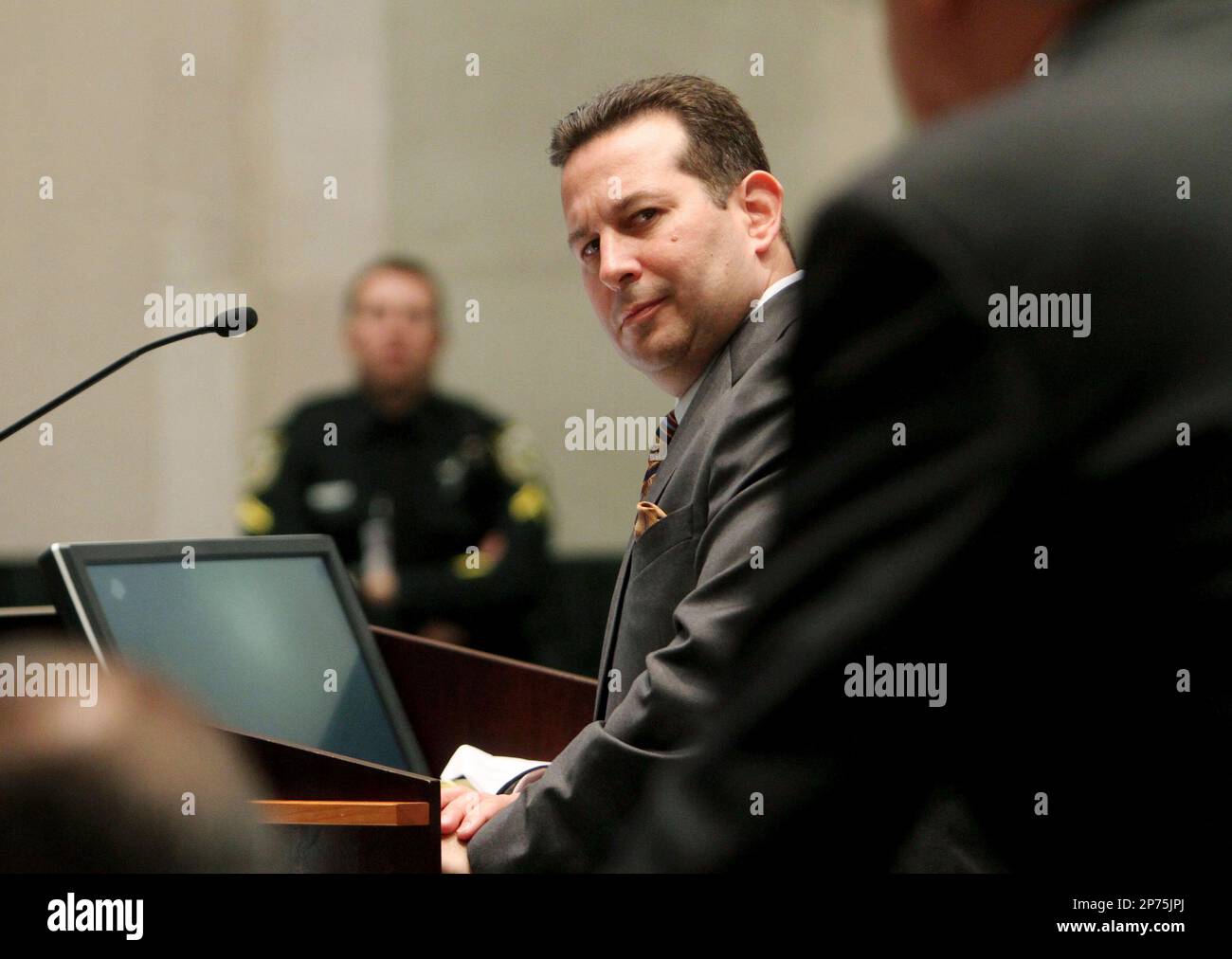 Defense attorney Jose Baez looks back at the prosecution during the ...