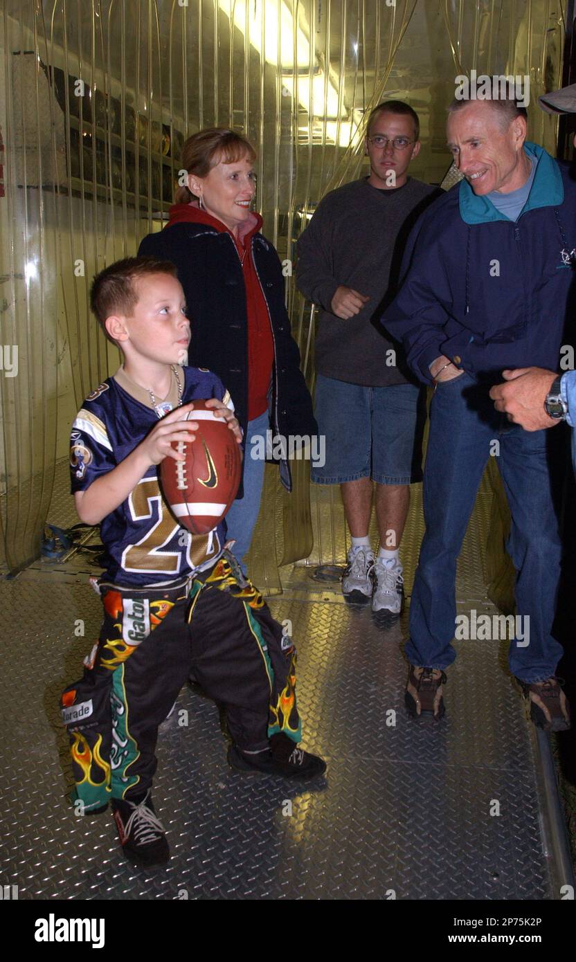 NASCAR driver Mark Martin, right, watches his son, Matt, 10, after one ...