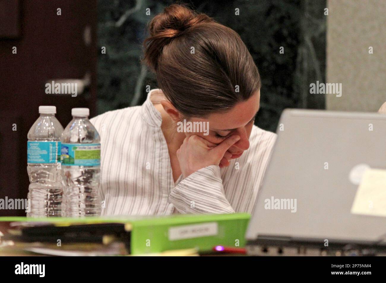 During forensic expert Dr. Spitz's testimony, Casey Anthony turns her ...