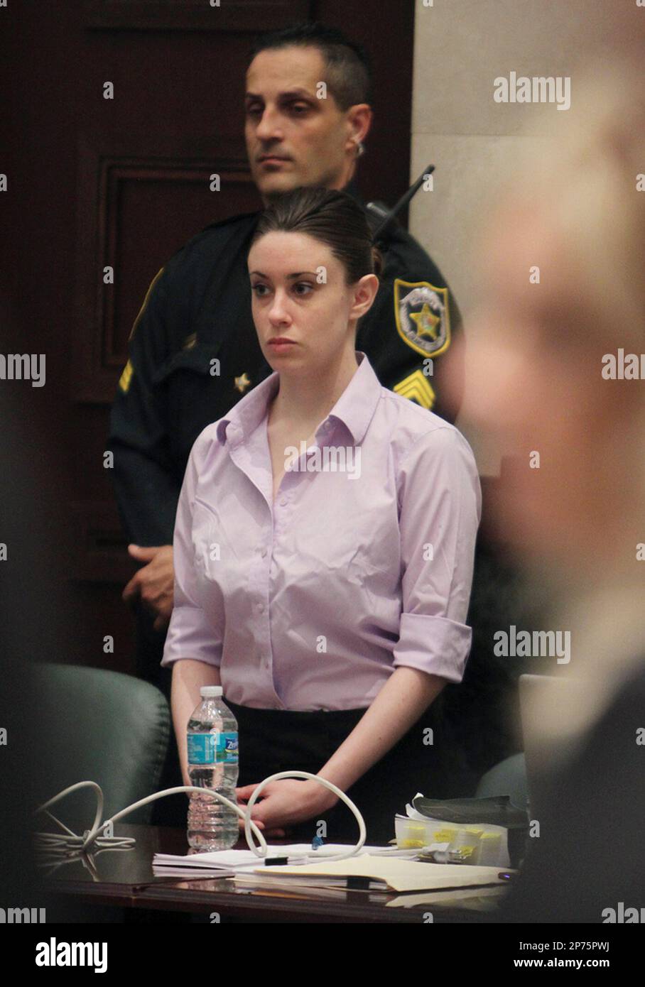 Casey Anthony is shown at the defense table before the start of court ...