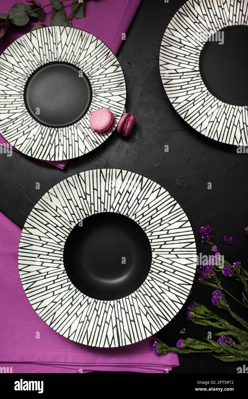 fancy plates black background restaurant setting Stock Photo - Alamy