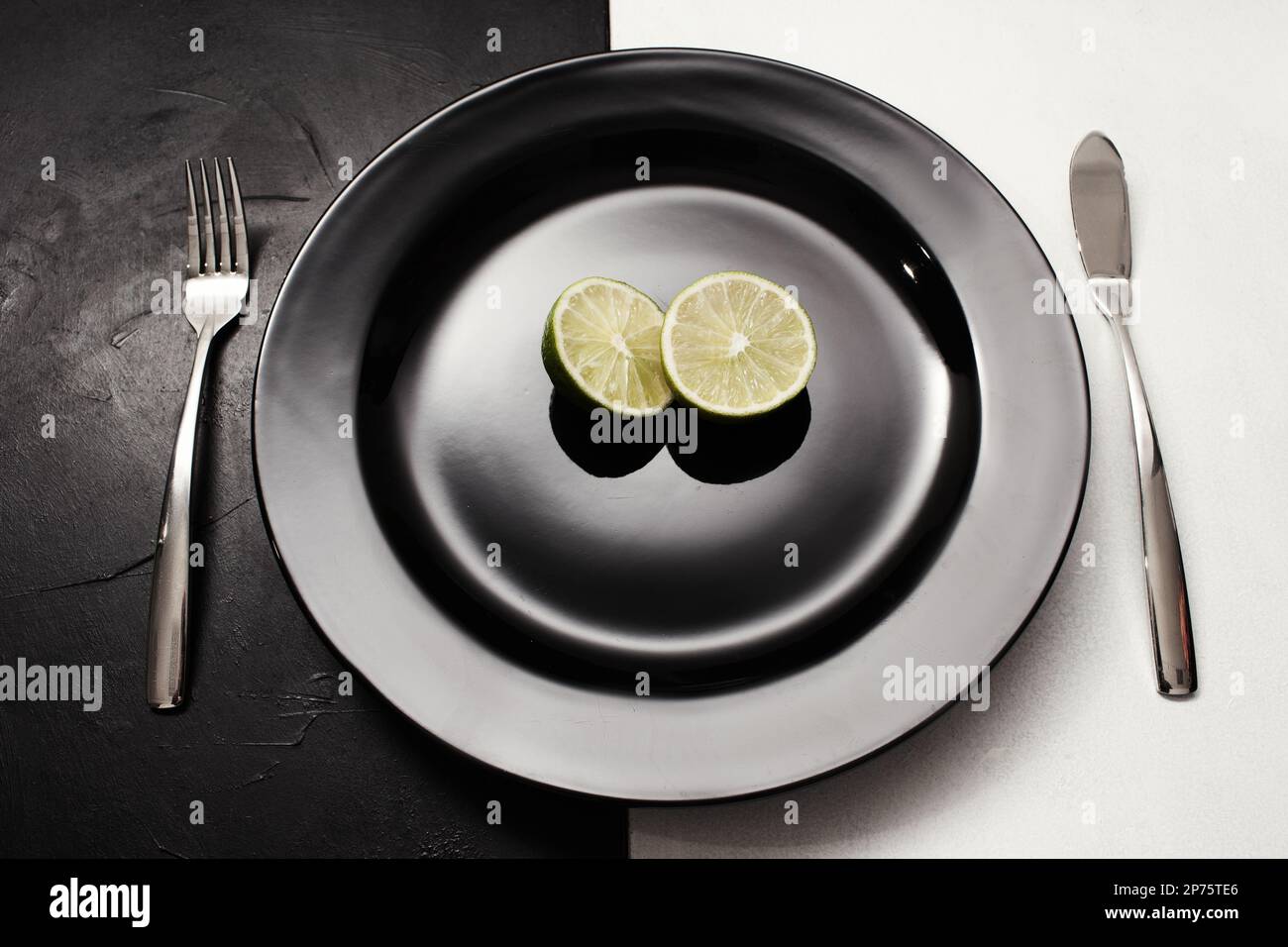 plate black and white background contrast Stock Photo - Alamy