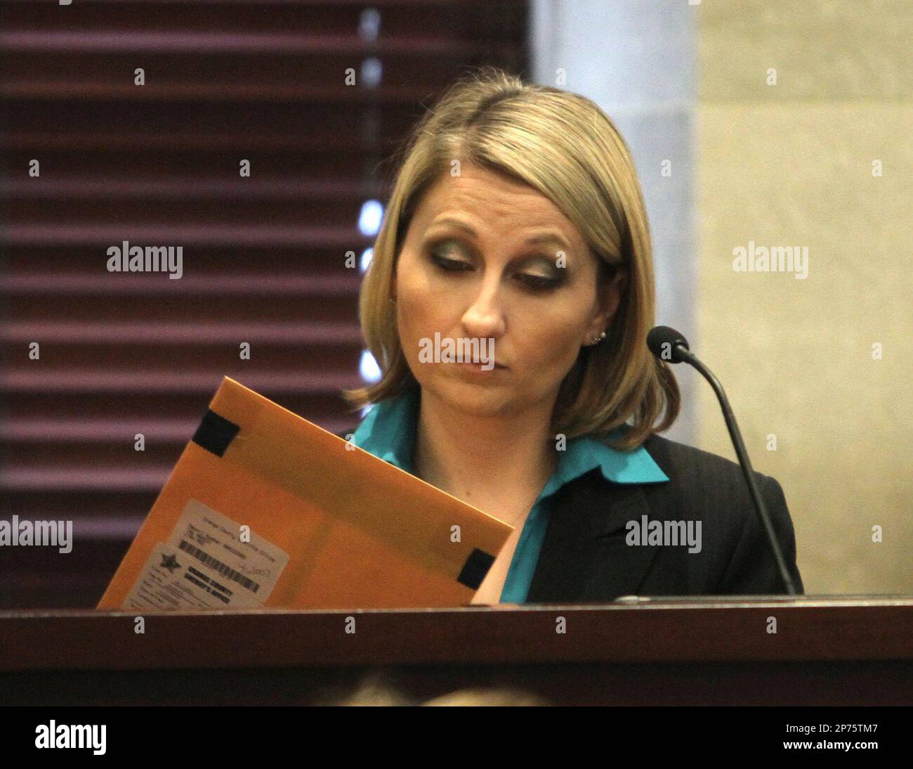 Alina Burroughs, a CSI investigator with Orange County Sheriff's Office ...