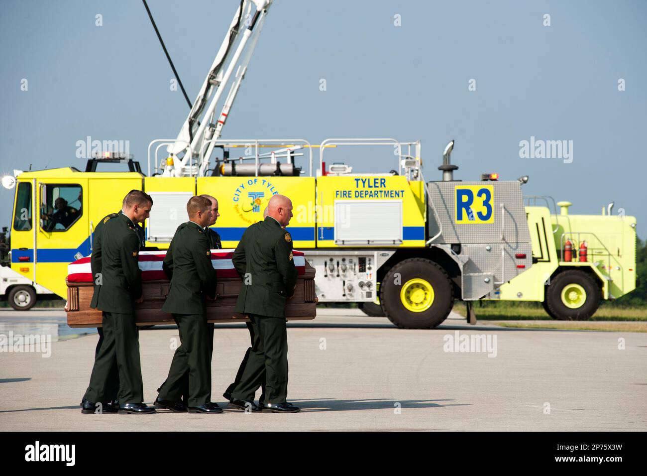 The body of U.S. Army Sgt. Joshua David Powell, 28, is carried across ...