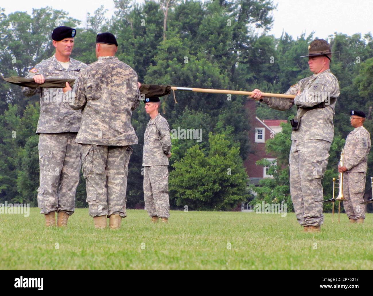 Soldiers complete casing one of the flags during a colors casing ...