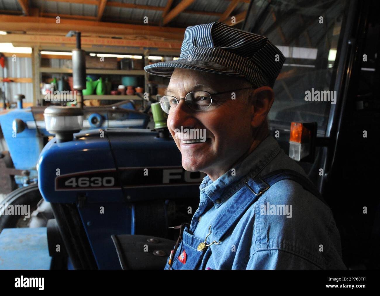 Gordon Fredickson stands in the garage where he keeps his collection of ...