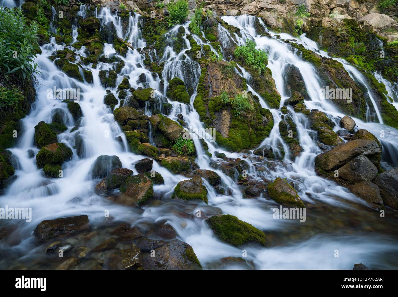 Water flowing through natural rock hi-res stock photography and images ...