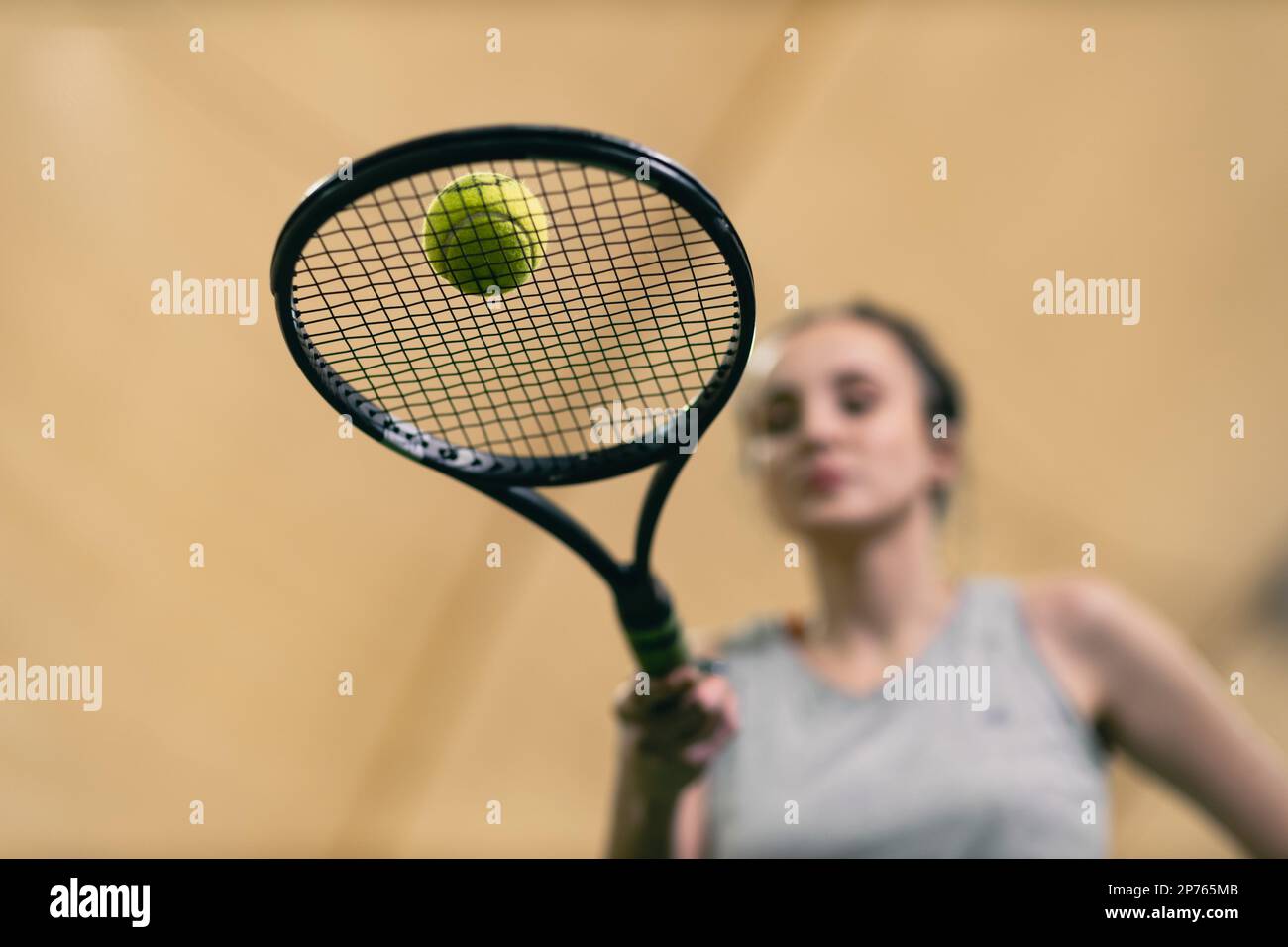Tennis woman player hold racket and ball at court. Bottom view Stock ...