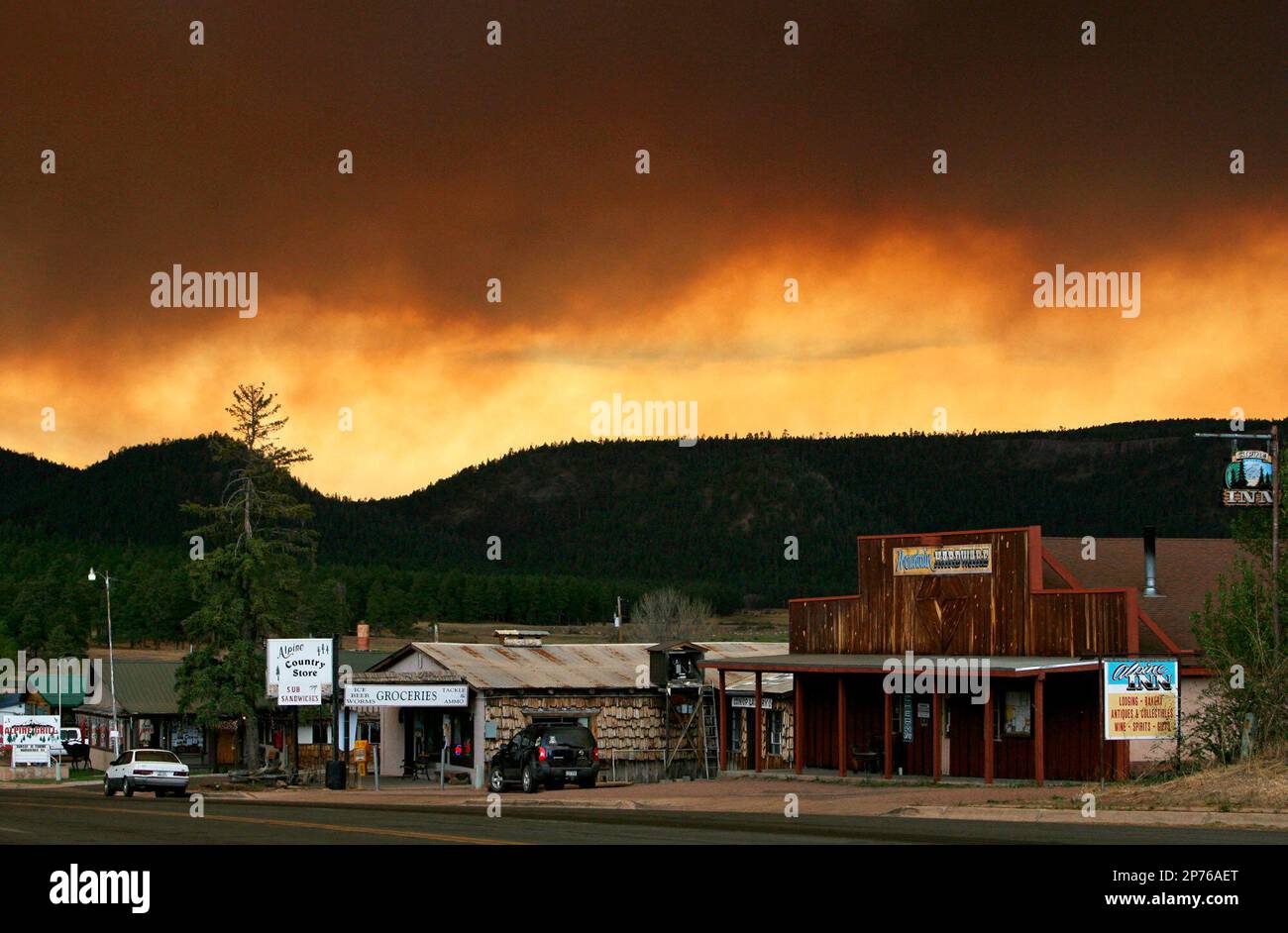 In this Wednesday, June 1, 2011 photo, smoke fills the sky, casting an ...