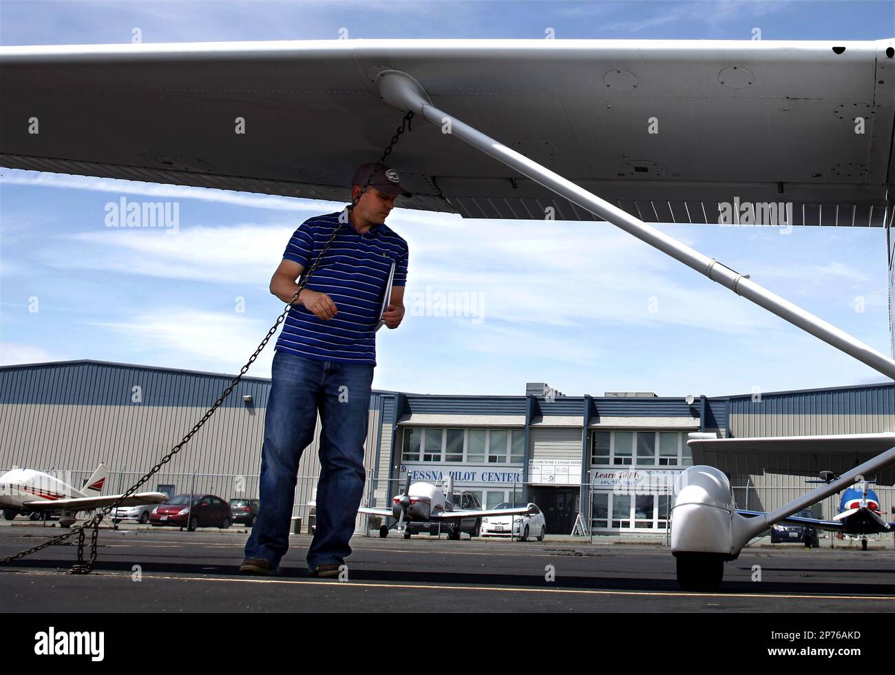 In this May 26, 2011 photo, student pilot, Dean Dugger performs a pre ...
