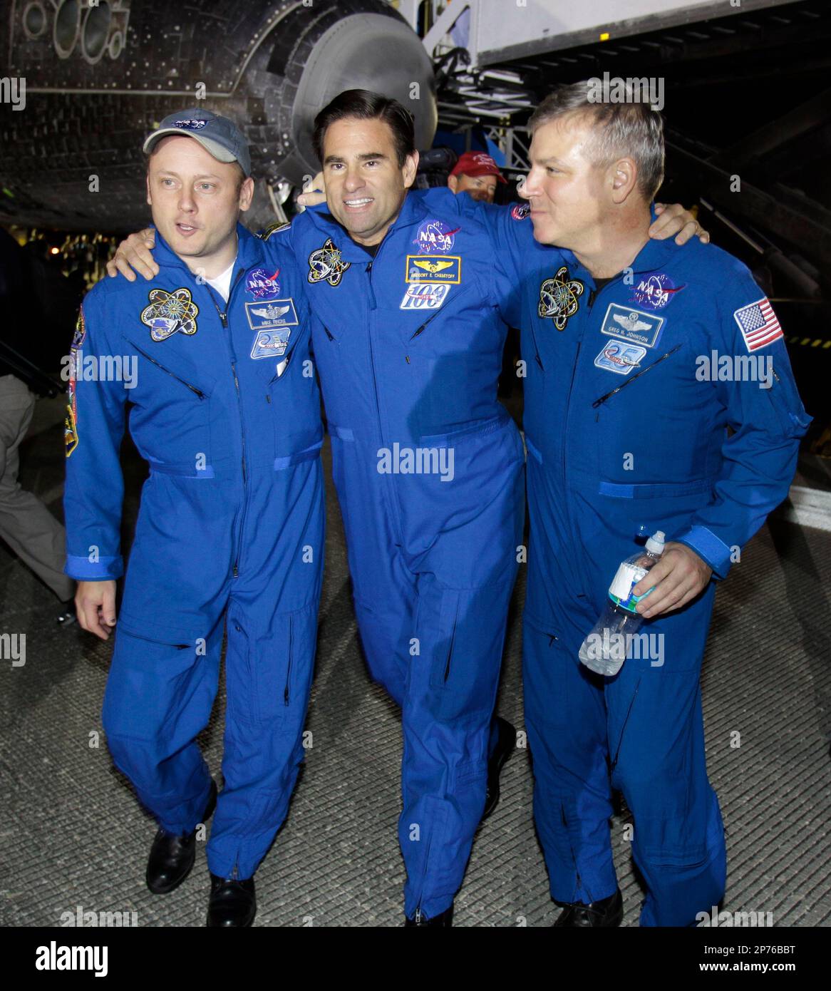 Crew members of Space shuttle Endeavour, from left, mission specialists ...